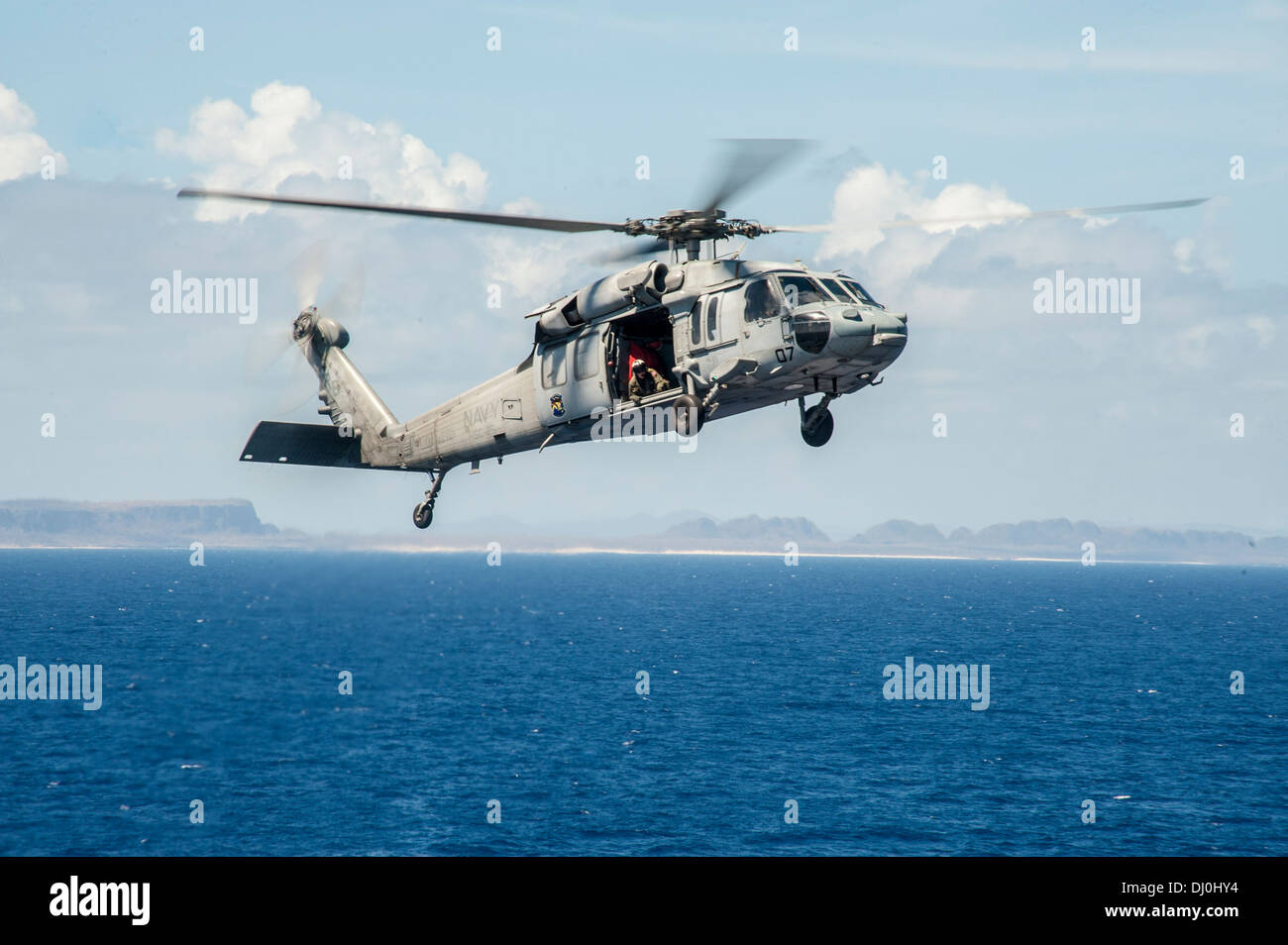 An MH-60R Seahawk helicopter from the Saberhawks of Helicopter Maritime ...