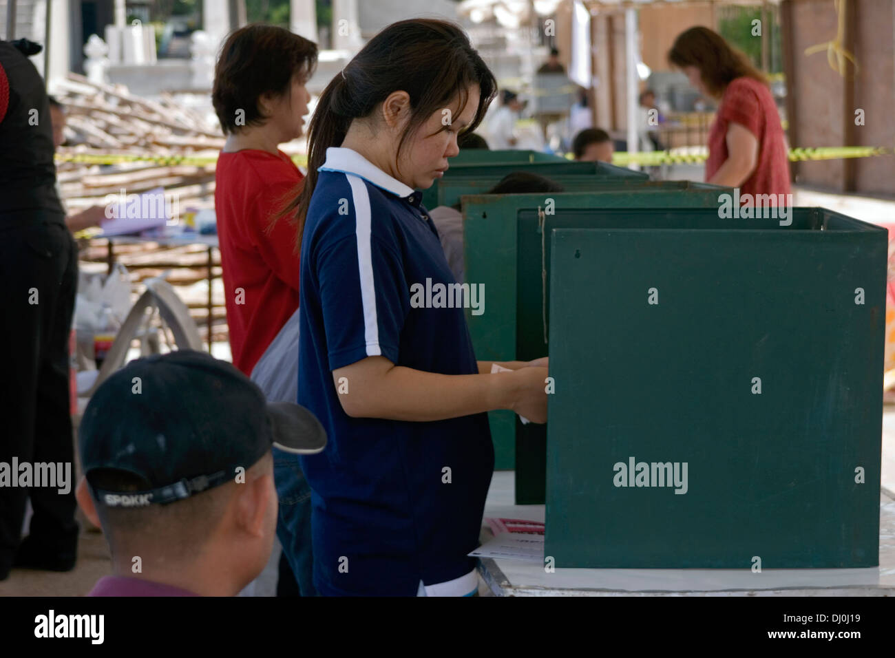 Woman voting booth hi-res stock photography and images - Alamy