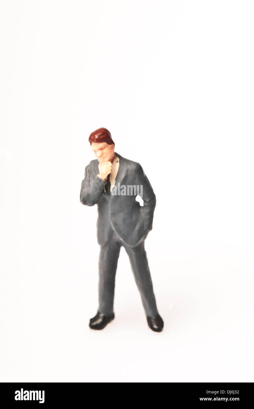 Miniature figurine thinking hi-res stock photography and images - Alamy