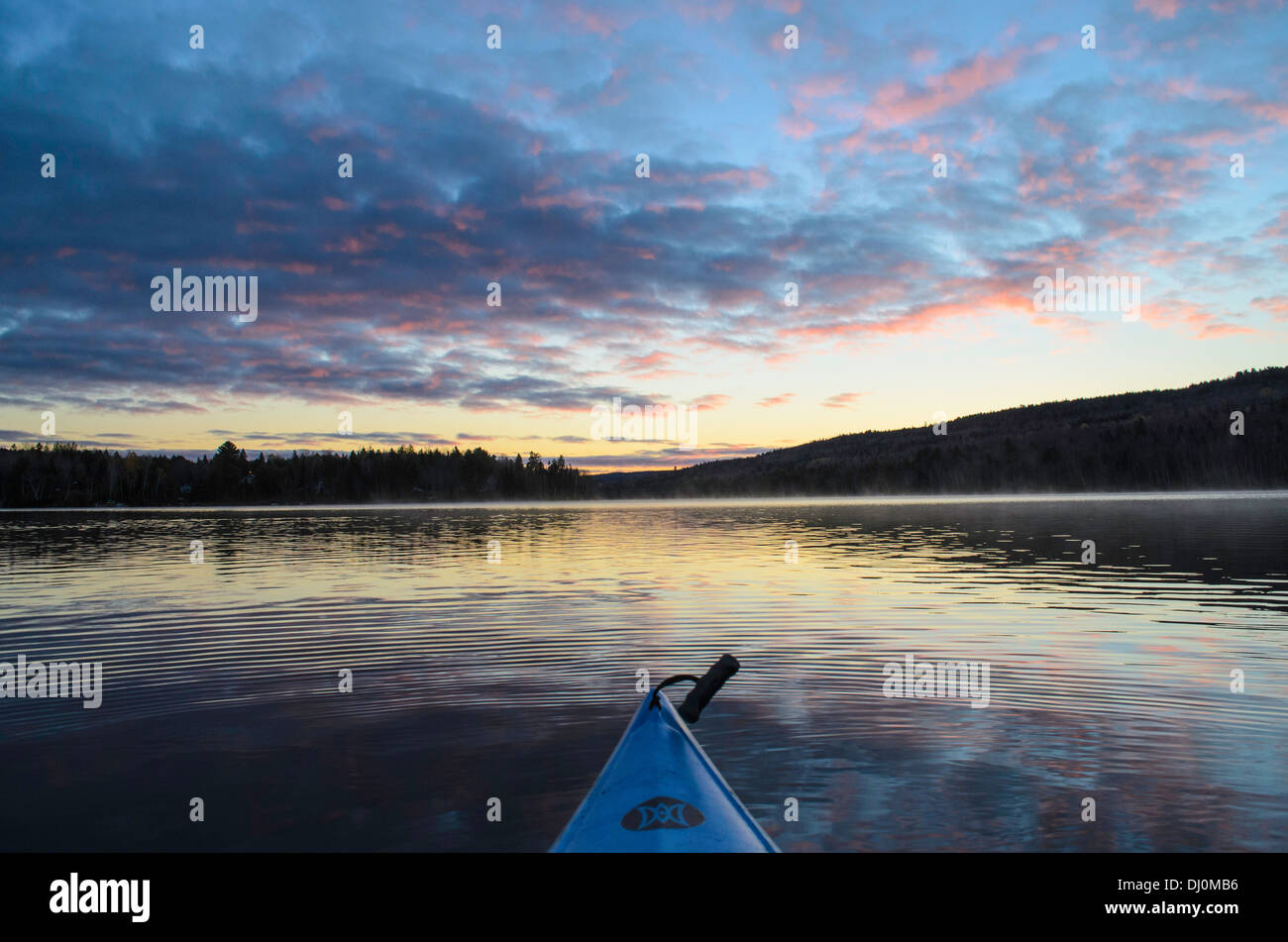 kayak at sunrise Stock Photo - Alamy