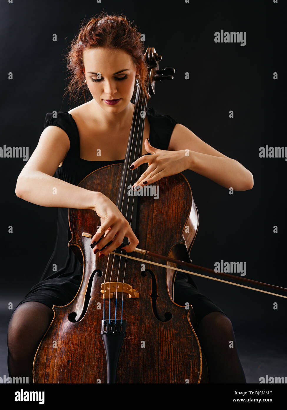 Female playing music instrument concert hi-res stock photography and ...