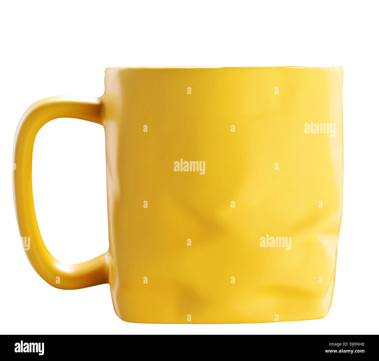 Yellow bruised ceramic tea cup Stock Photo - Alamy
