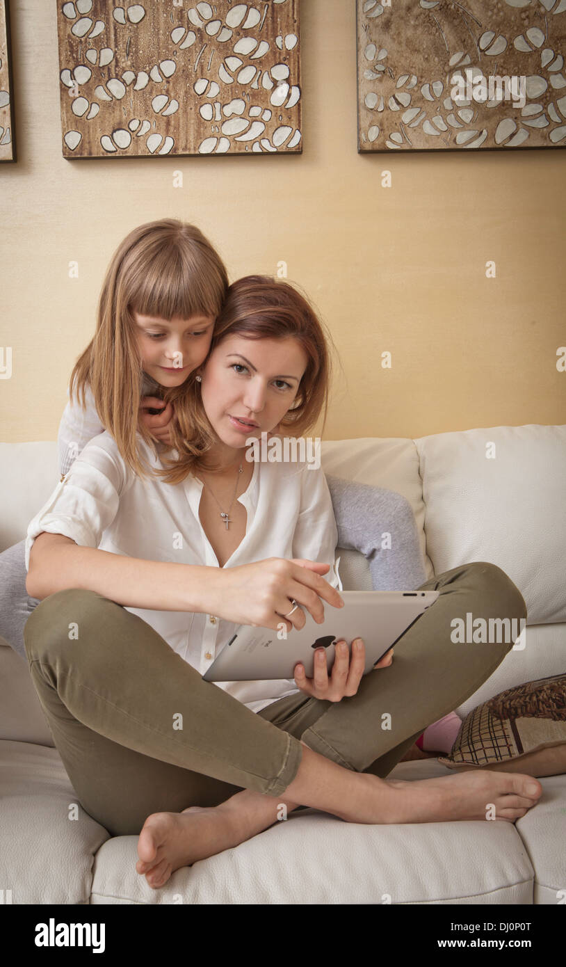 Family couch parents daughter hi-res stock photography and images - Alamy