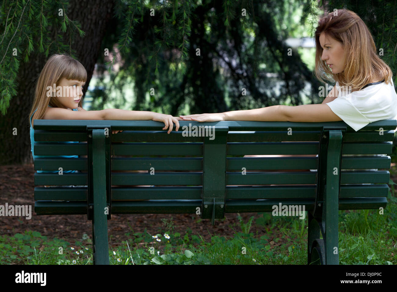 Two Girls Sitting On Park Bench High Resolution Stock Photography and ...