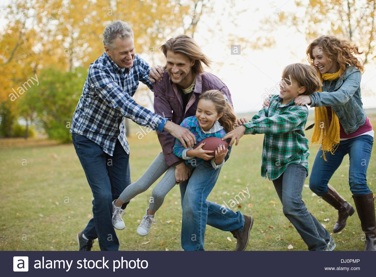 Cheerful mother son football hi-res stock photography and images - Alamy