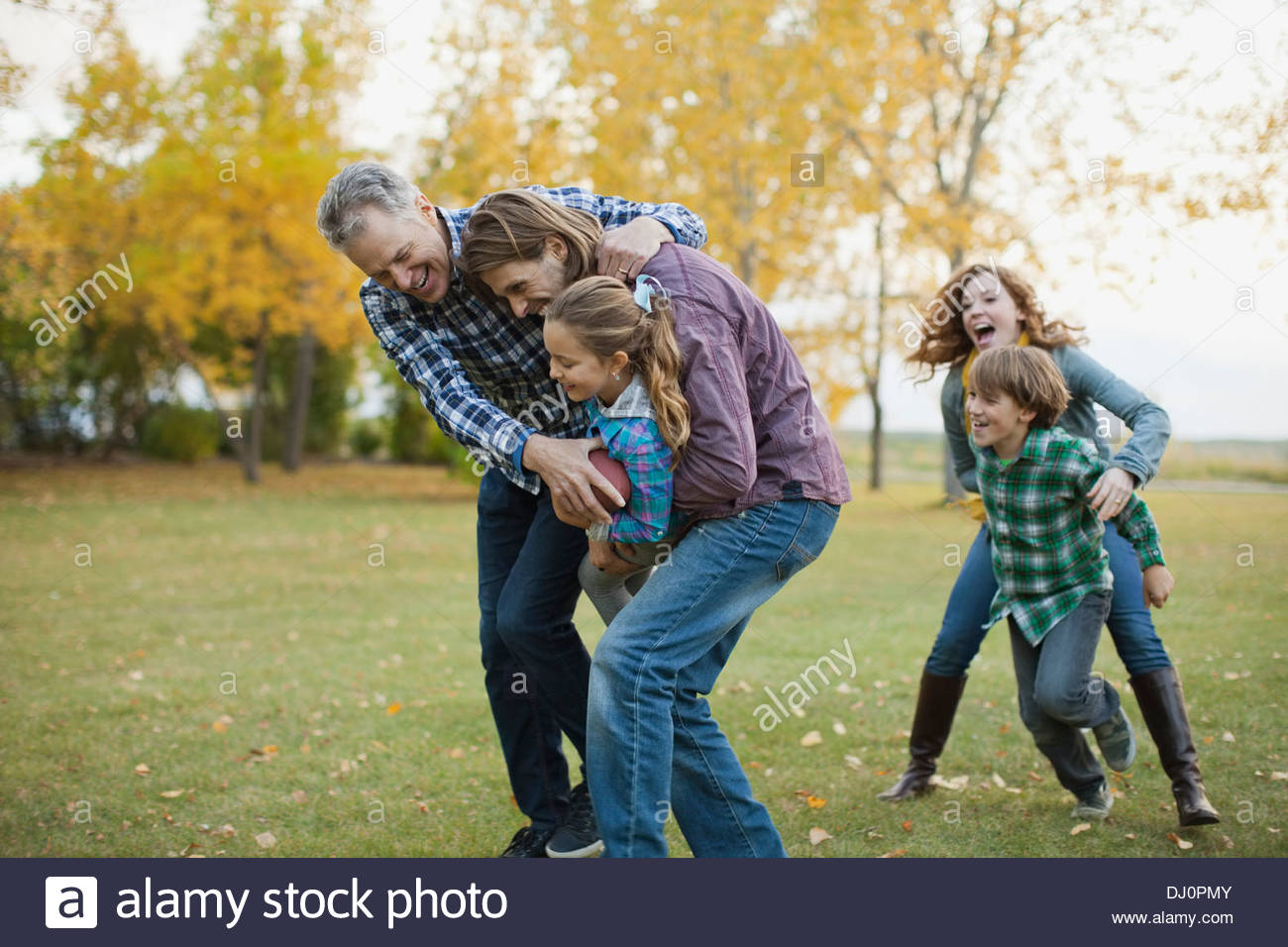 Family Playing American Football