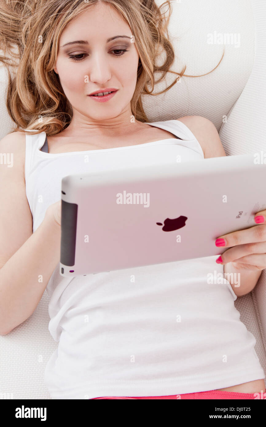 Lifestyle woman on sofa hi-res stock photography and images - Alamy