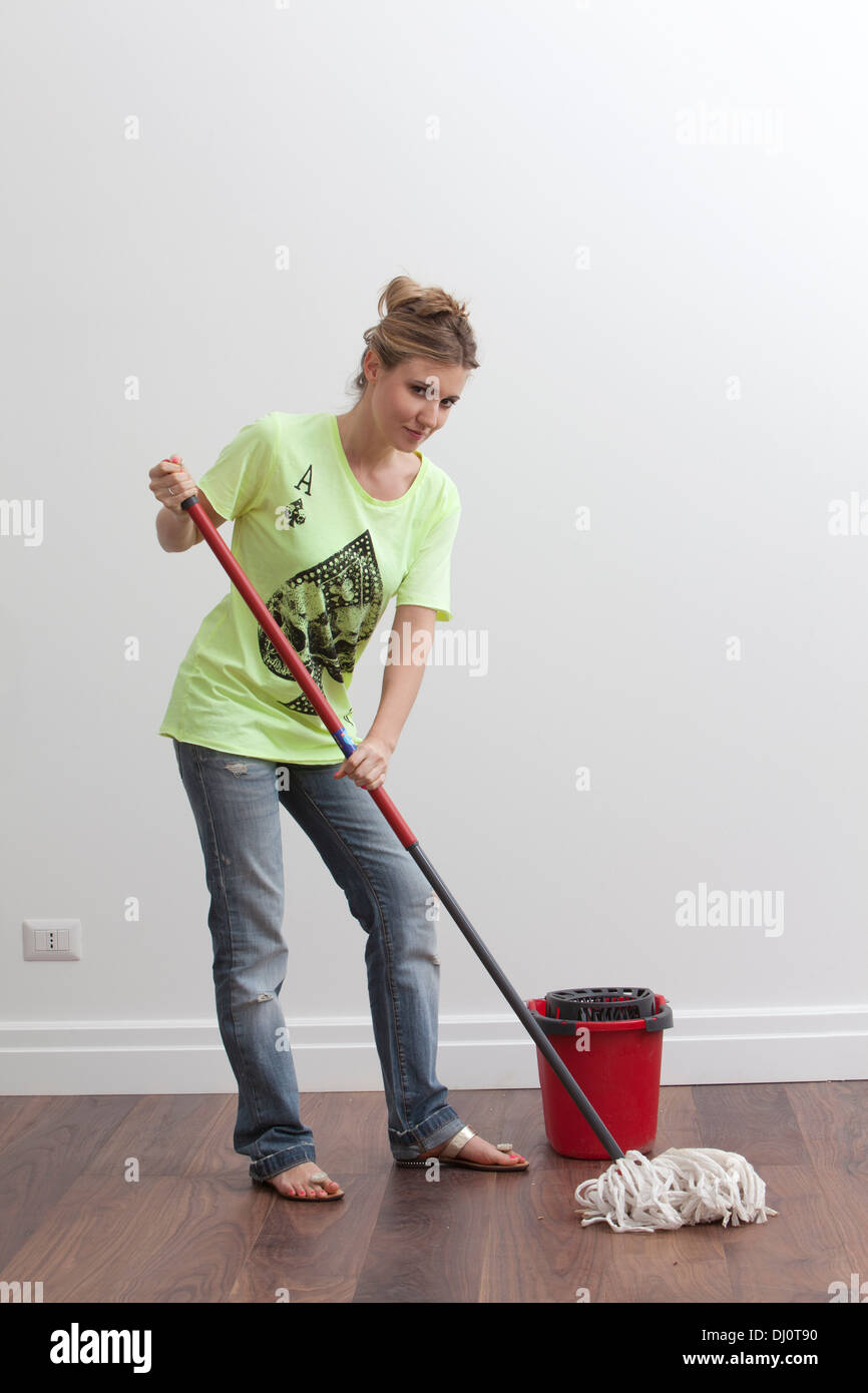 Woman scrubbing floor hi-res stock photography and images - Alamy