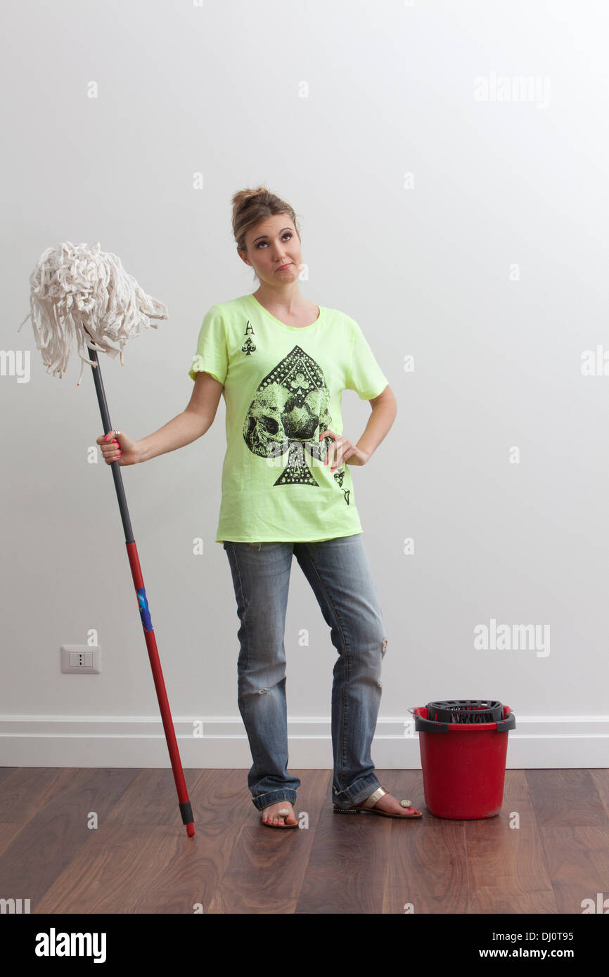 Woman scrubbing floor hi-res stock photography and images - Alamy