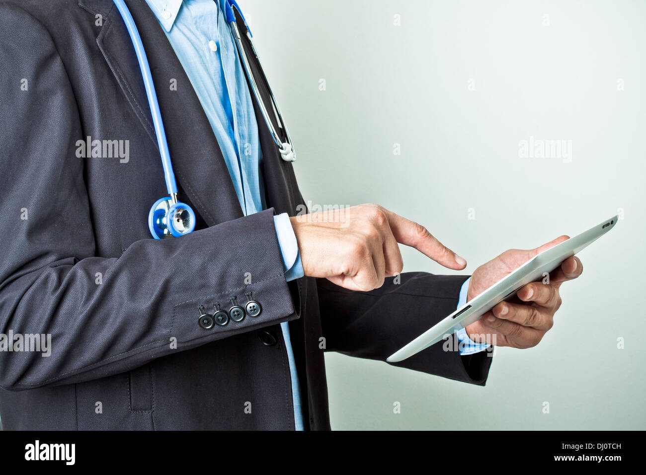 Doctor holding ipad hi-res stock photography and images - Alamy