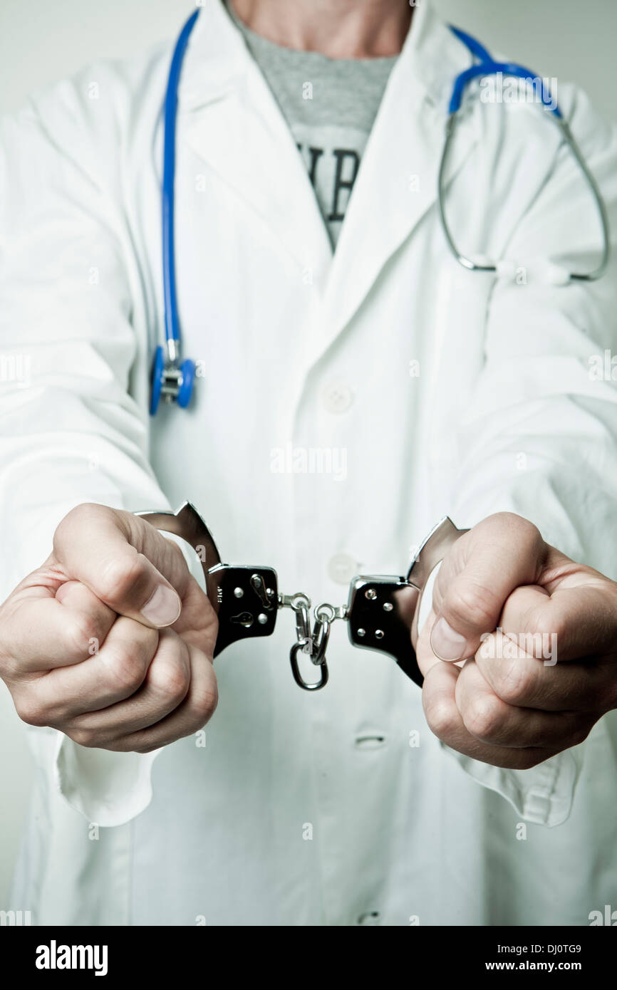 Doctor handcuffs hi-res stock photography and images - Alamy