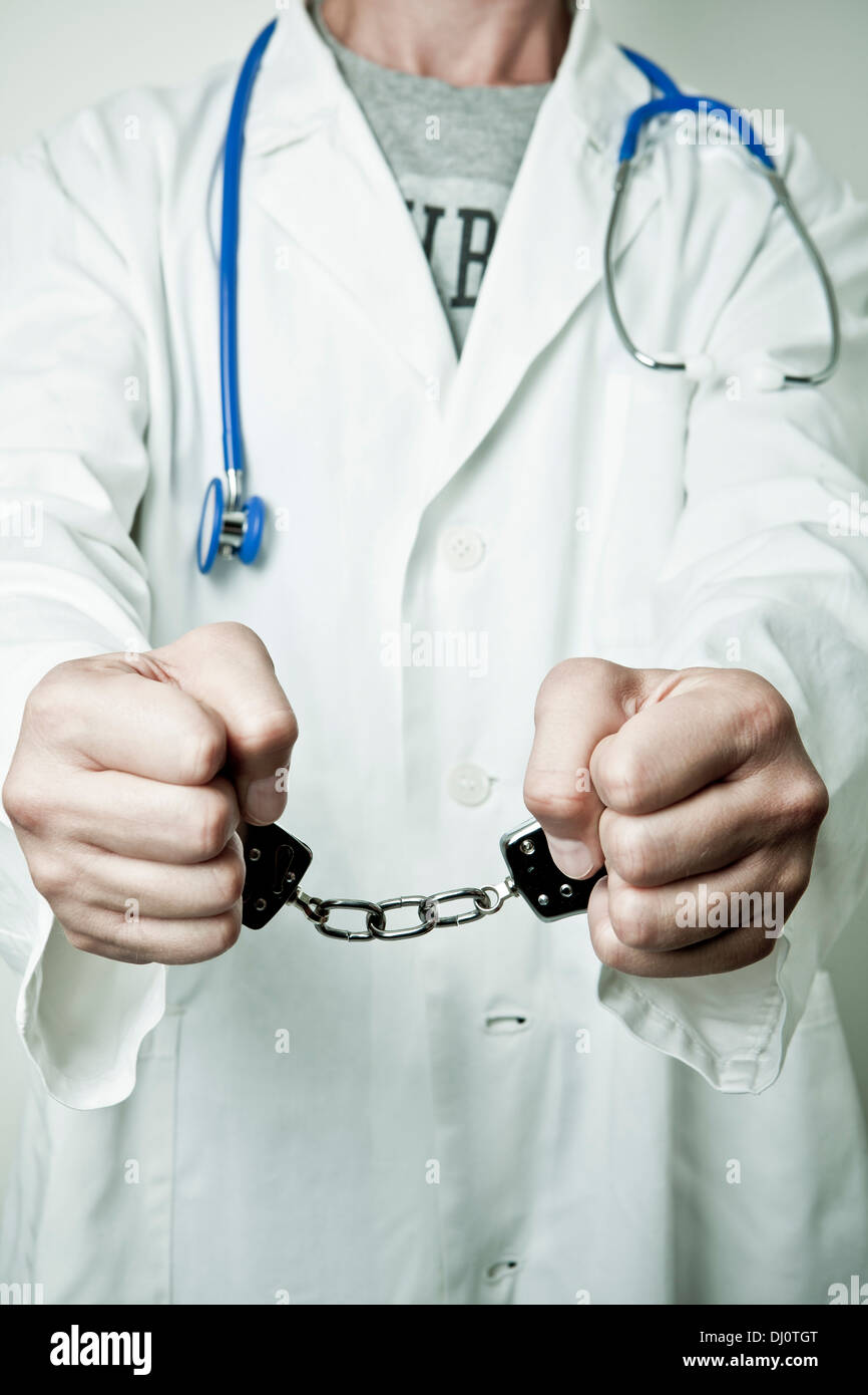 doctor with handcuffs Stock Photo - Alamy
