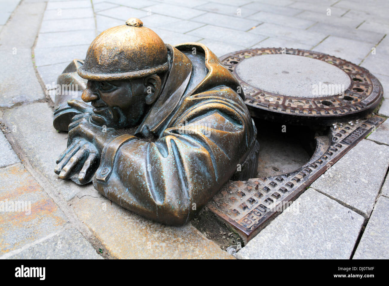 Statue of Cumil, happy sewage worker, Bratislava, Slovakia Stock Photo ...