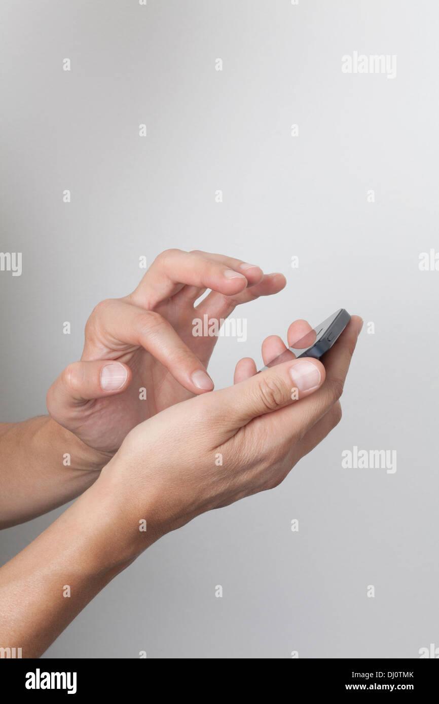 Hands holding telephones hi-res stock photography and images - Alamy