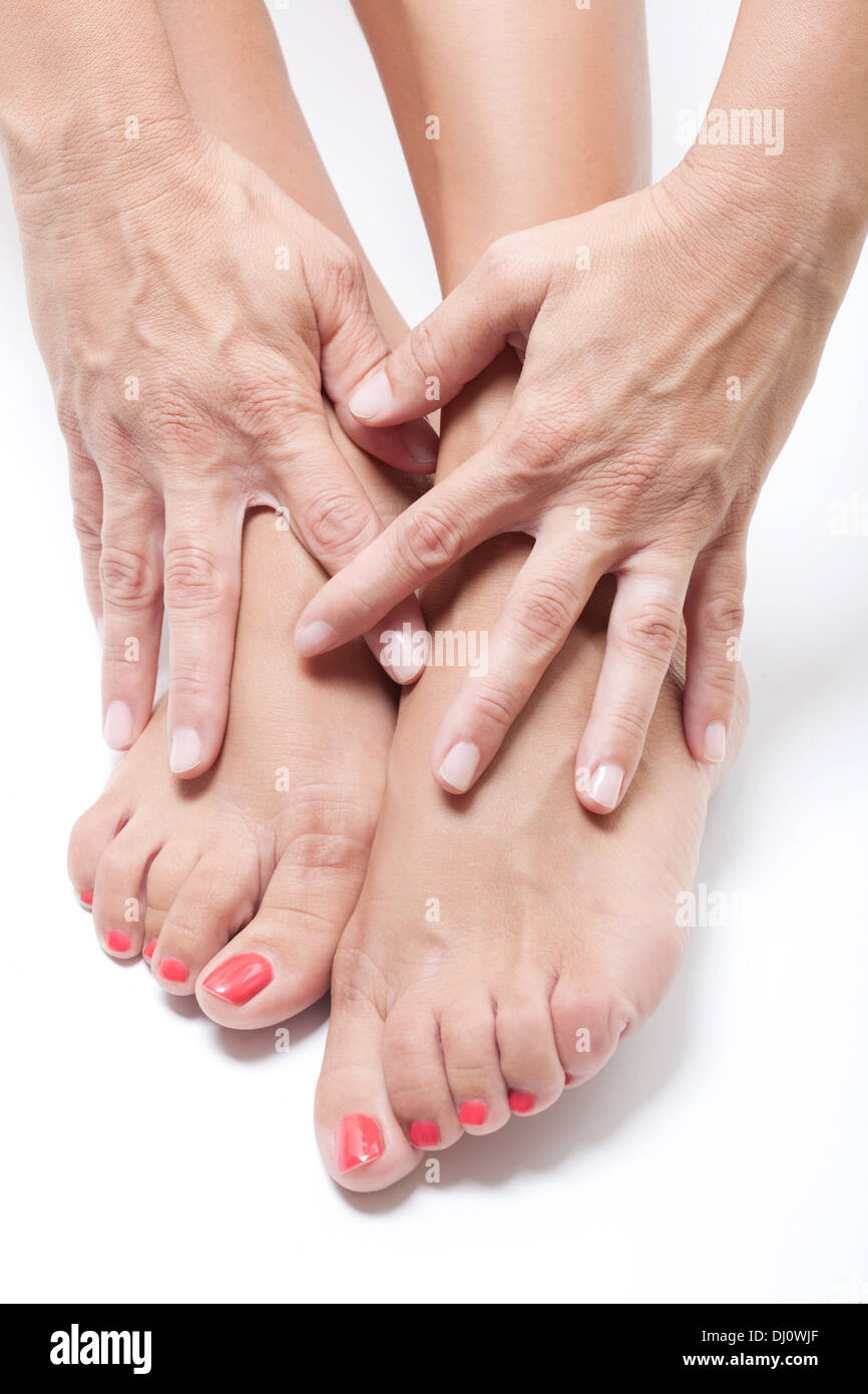 Hands woman feet hi-res stock photography and images - Alamy