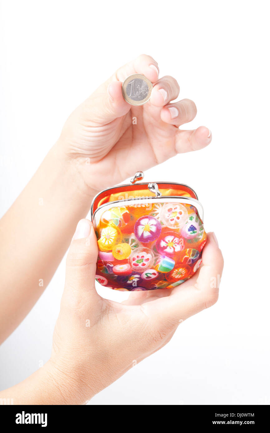 Hand with coin hi-res stock photography and images - Alamy