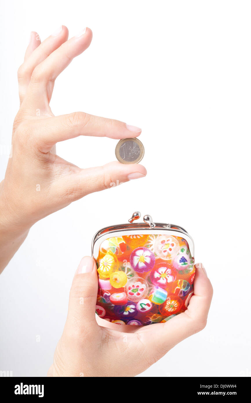 Hand with coin hi-res stock photography and images - Alamy