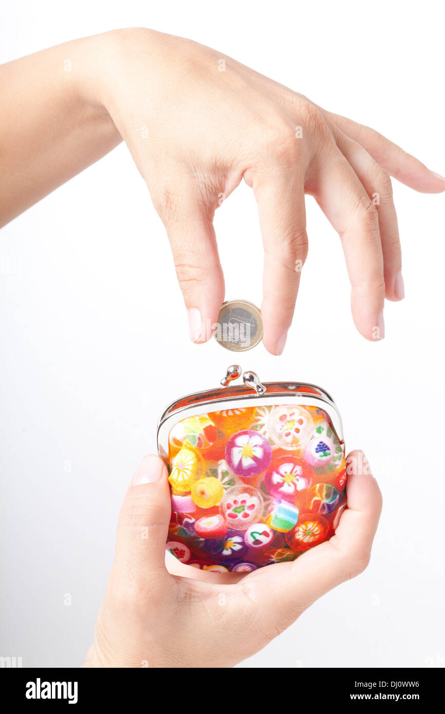 Hand with coin hi-res stock photography and images - Alamy