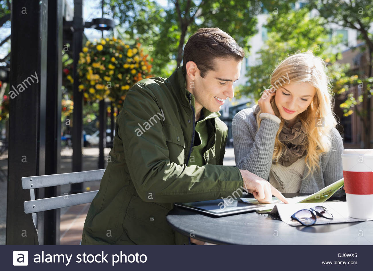 Two people reading map hi-res stock photography and images - Alamy
