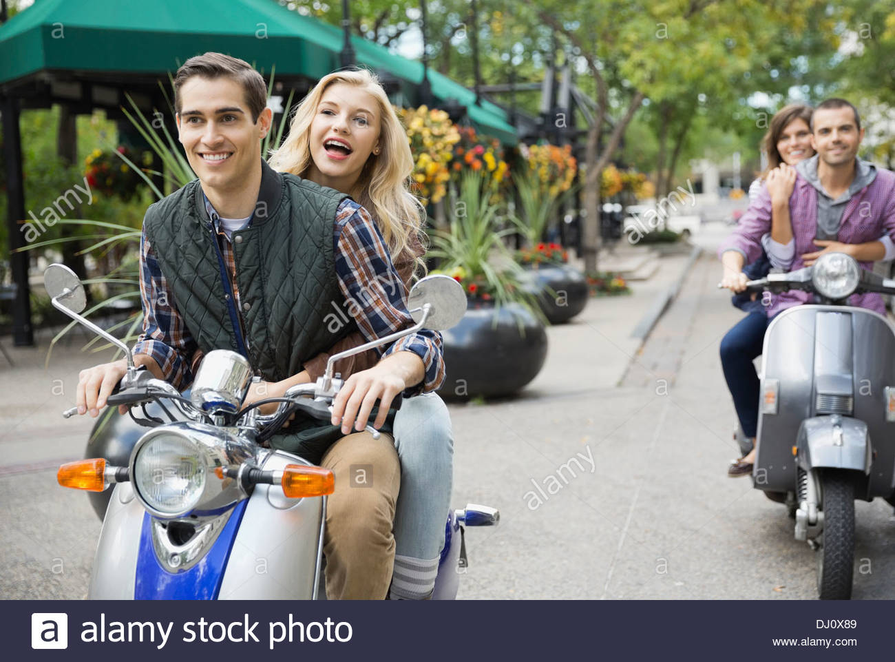 Two couples sitting hi-res stock photography and images - Alamy