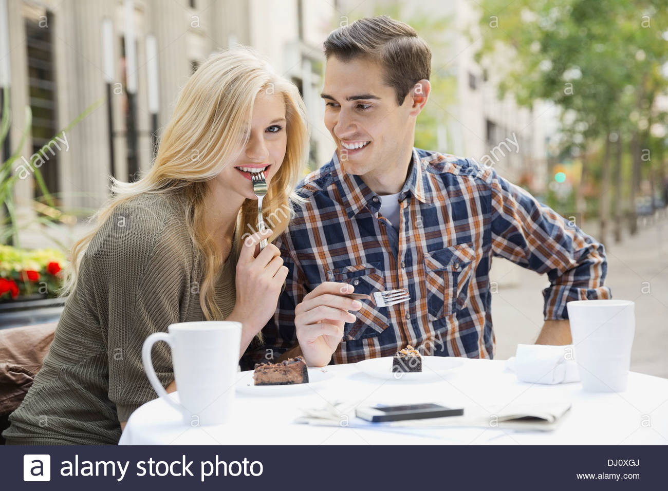 Two men eating restaurant hi-res stock photography and images - Alamy