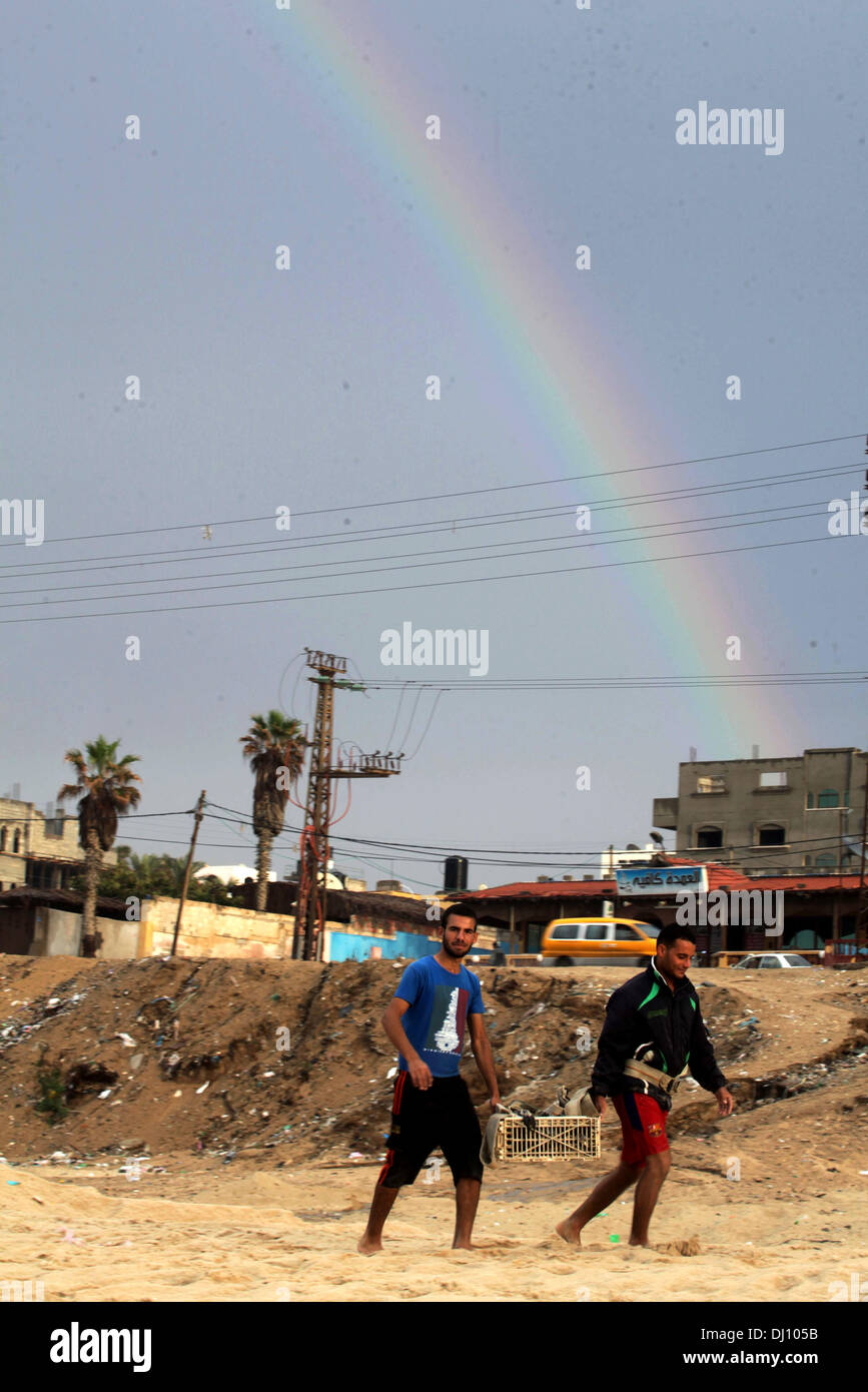 Gaza City, Gaza Strip, Palestinian Territory, . 18th Nov, 2013. Palestinians walk at the beach ...