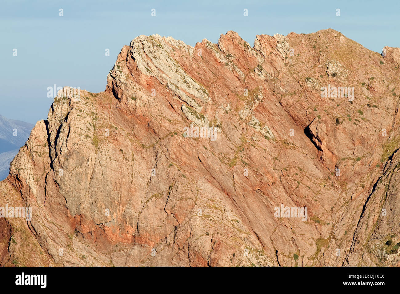 A red-coloured rock on a peak of Vardousia mountain, central Greece ...