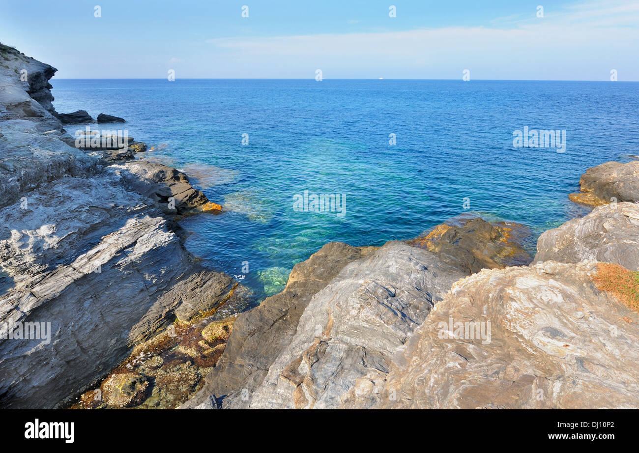 Turquoise blue sea on the rocky coast of Corsica Stock Photo - Alamy