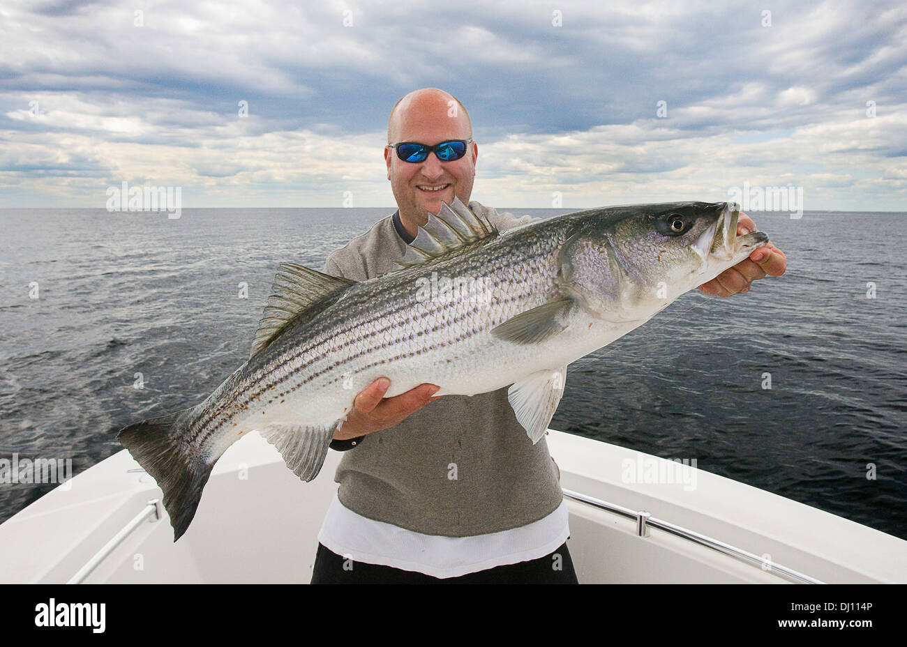 Fish man boat hi-res stock photography and images - Alamy