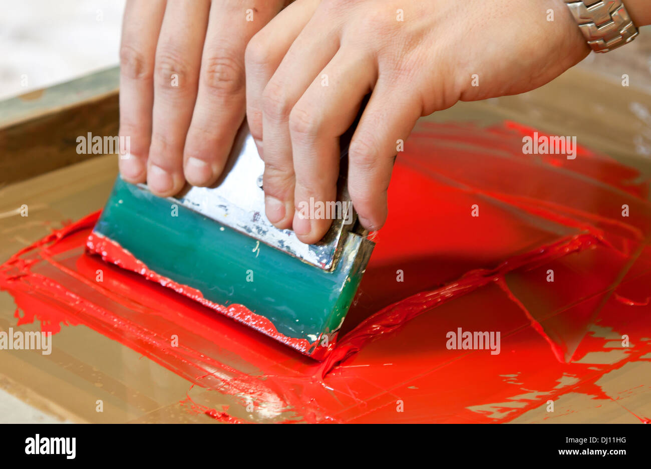 screen printing t shirts on print device Stock Photo - Alamy
