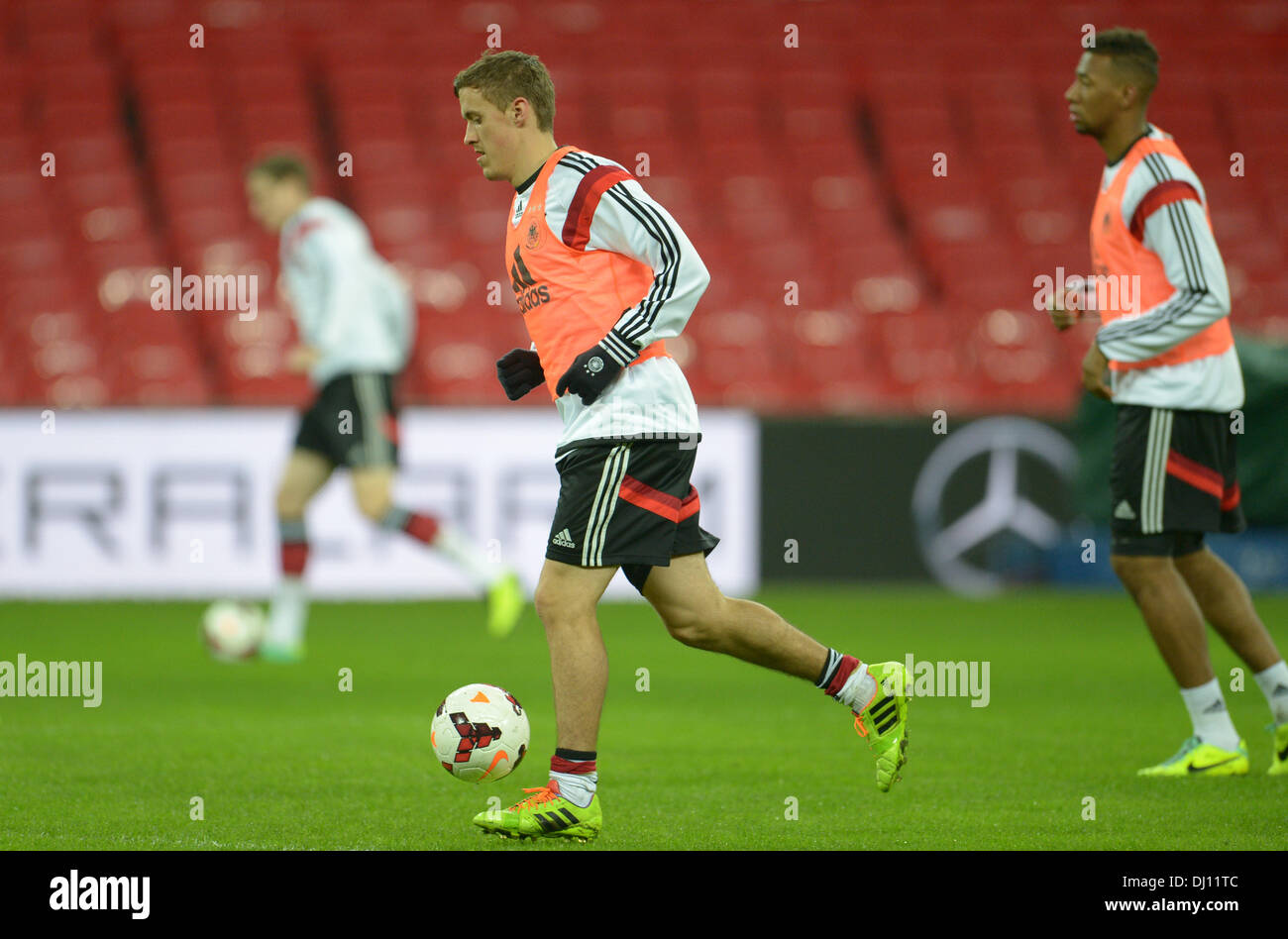 London, UK. 18th Nov, 2013. German national soccer player Max Kruse (L ...