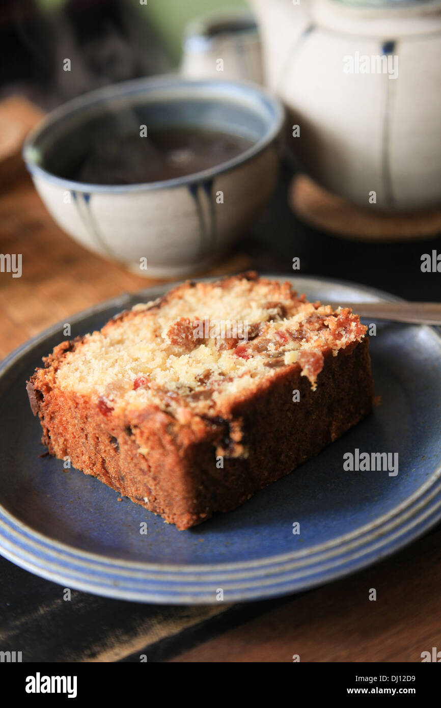 Slice of cake and cup of tea Stock Photo - Alamy