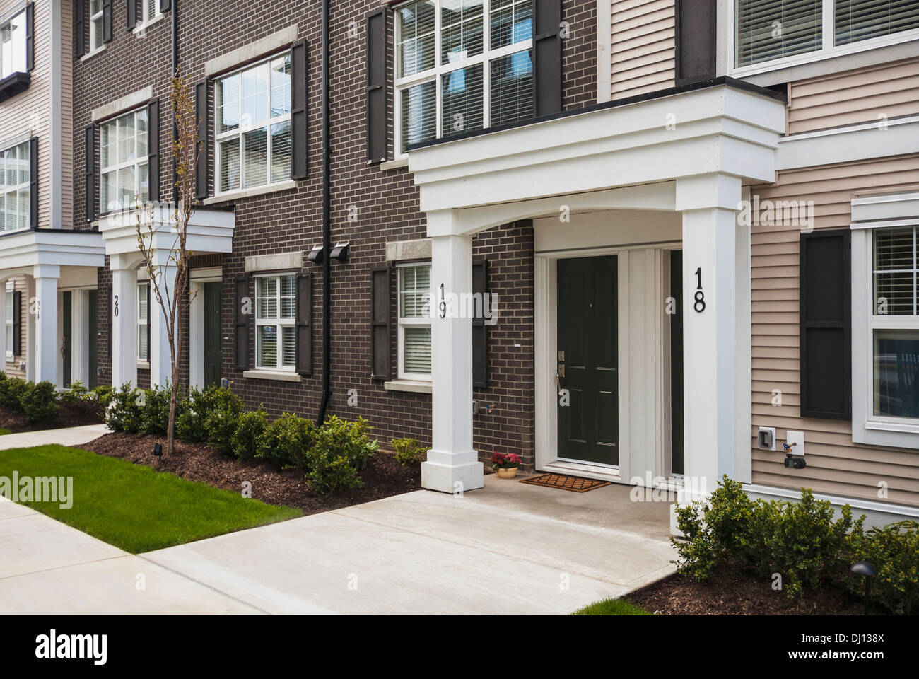 Modern Townhouse Row Exterior With Sidewalks And Porches; Surrey ...