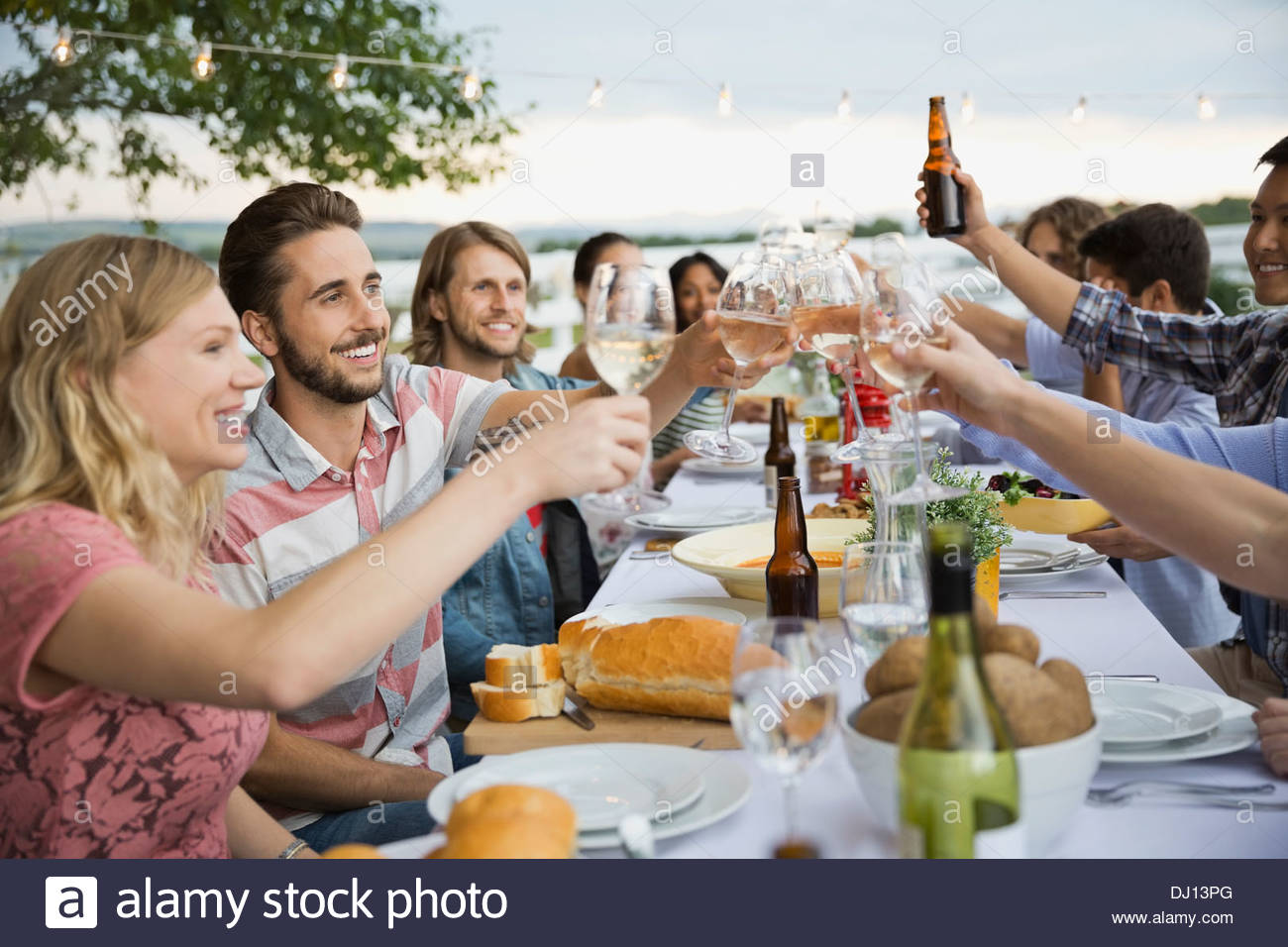 Group of friends dinner party hi-res stock photography and images - Alamy