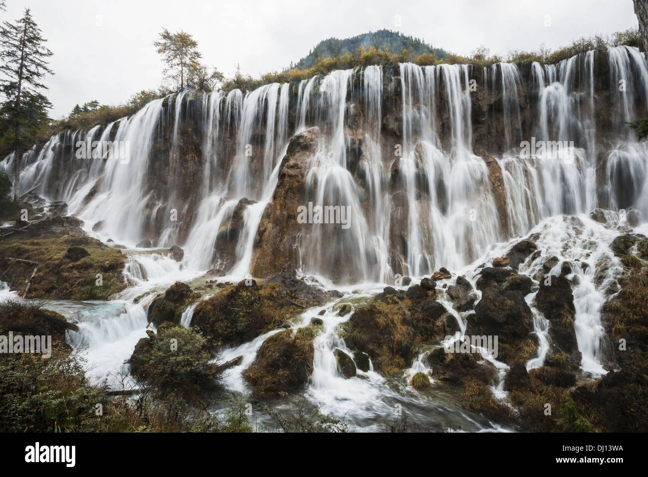 Waterfalls Over A Cliff And Streaming Over Rocks Stock Photo - Alamy