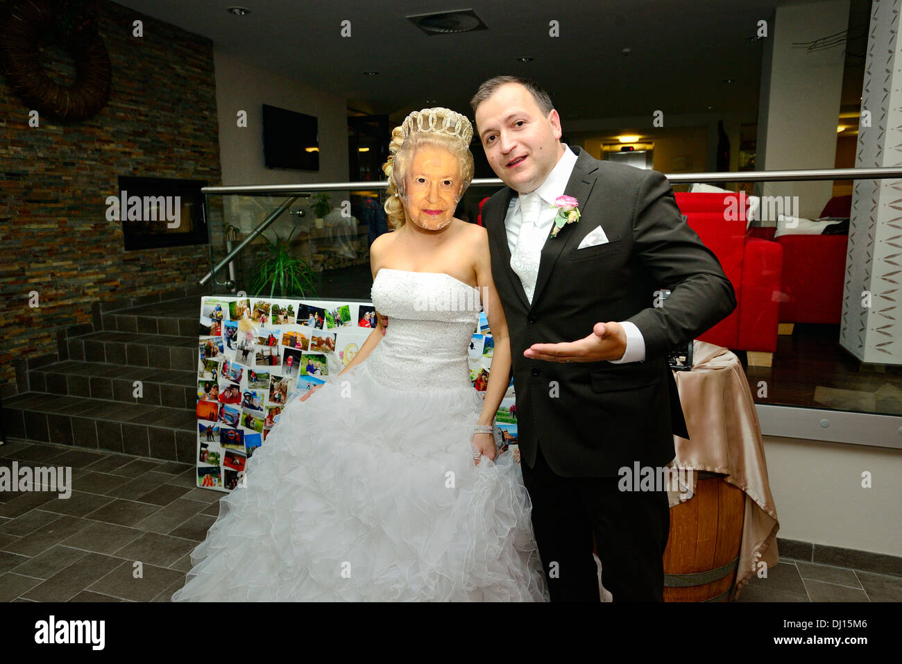 Bride and groom being taken a picture of during a wedding celebration ...