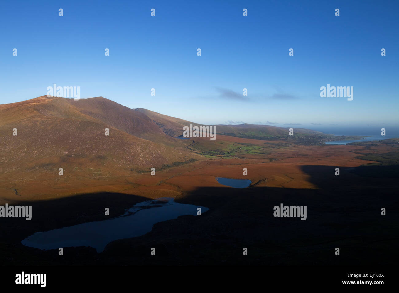 Lakes below the Conor Pass with Brandon Mountain and distant ...
