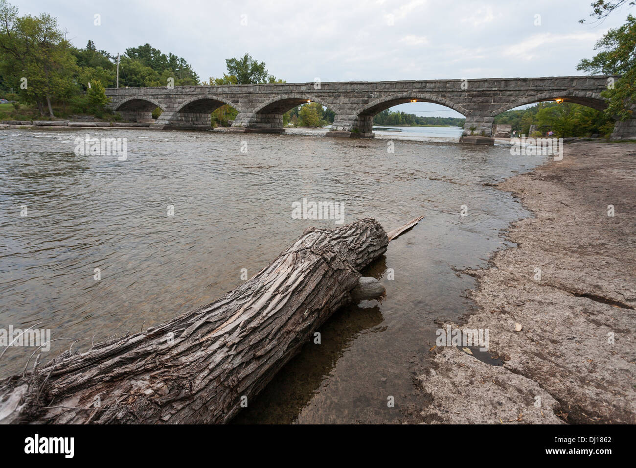 Five Span stone bridge in Pakenham with log. A view of the Lanark ...