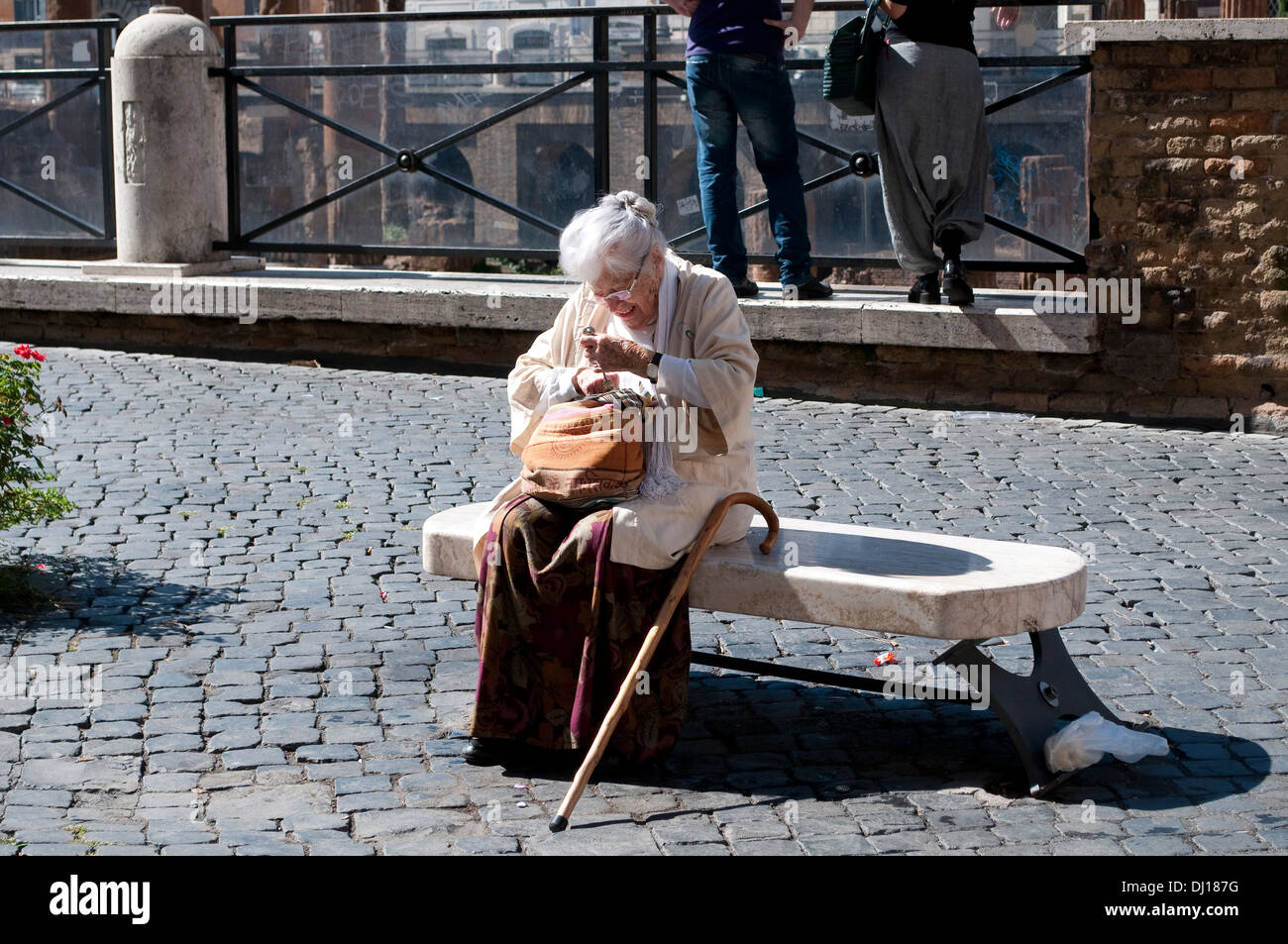 Old lady sitting on bench hi-res stock photography and images - Alamy