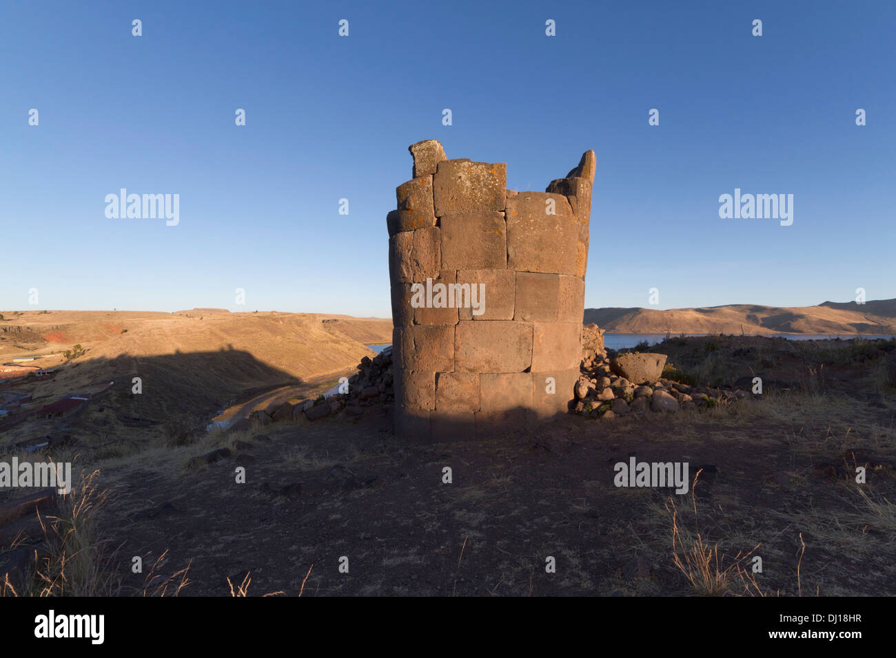 Chullpa (ancient Colla funerary tower) overlooking Lake Umayo ...