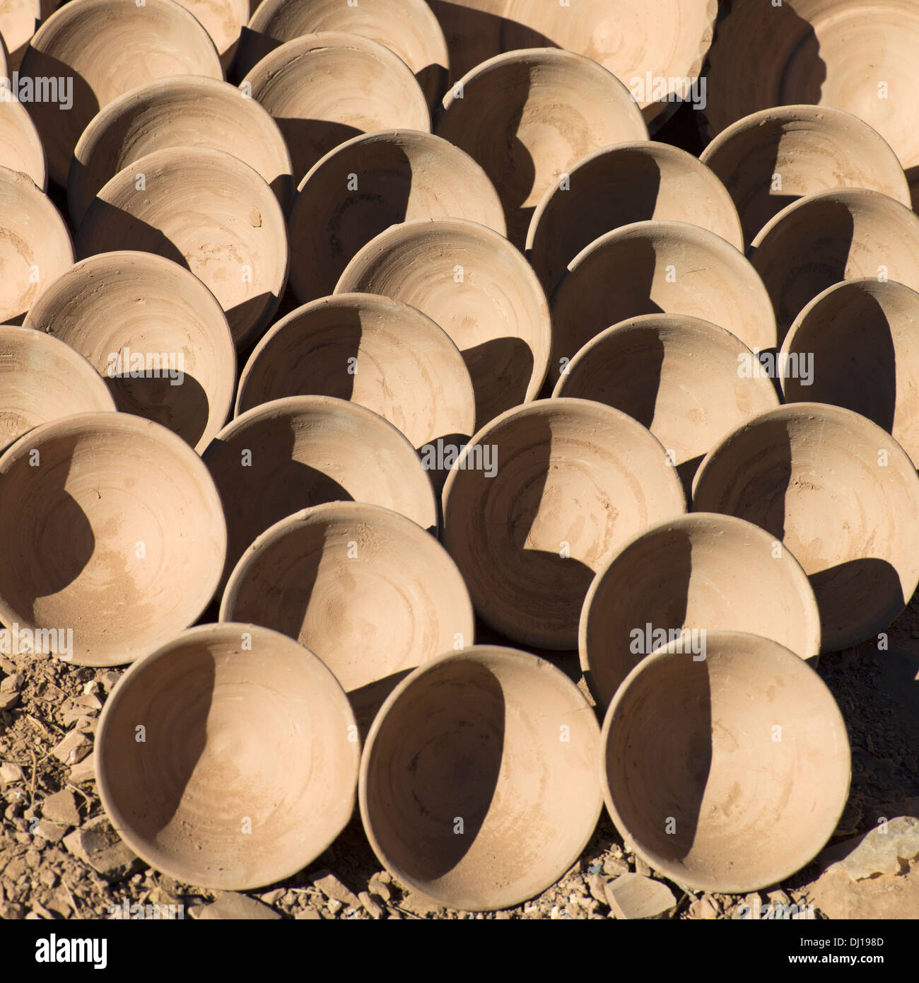 Rows Of Clay Bowls On Display On The Ground Stock Photo - Alamy