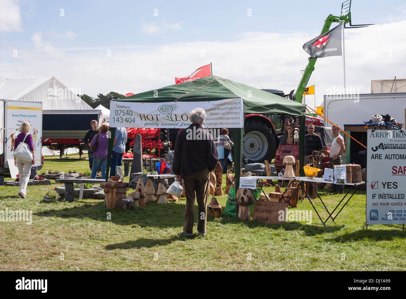 Wood carving stand at show Stock Photo - Alamy
