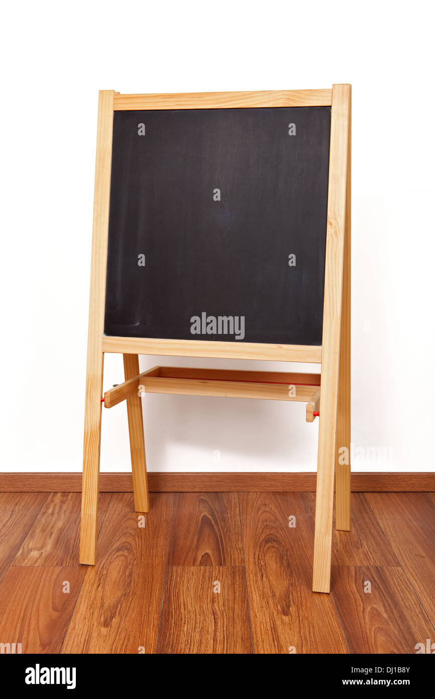 Wooden, clear blackboard in empty classroom Stock Photo - Alamy