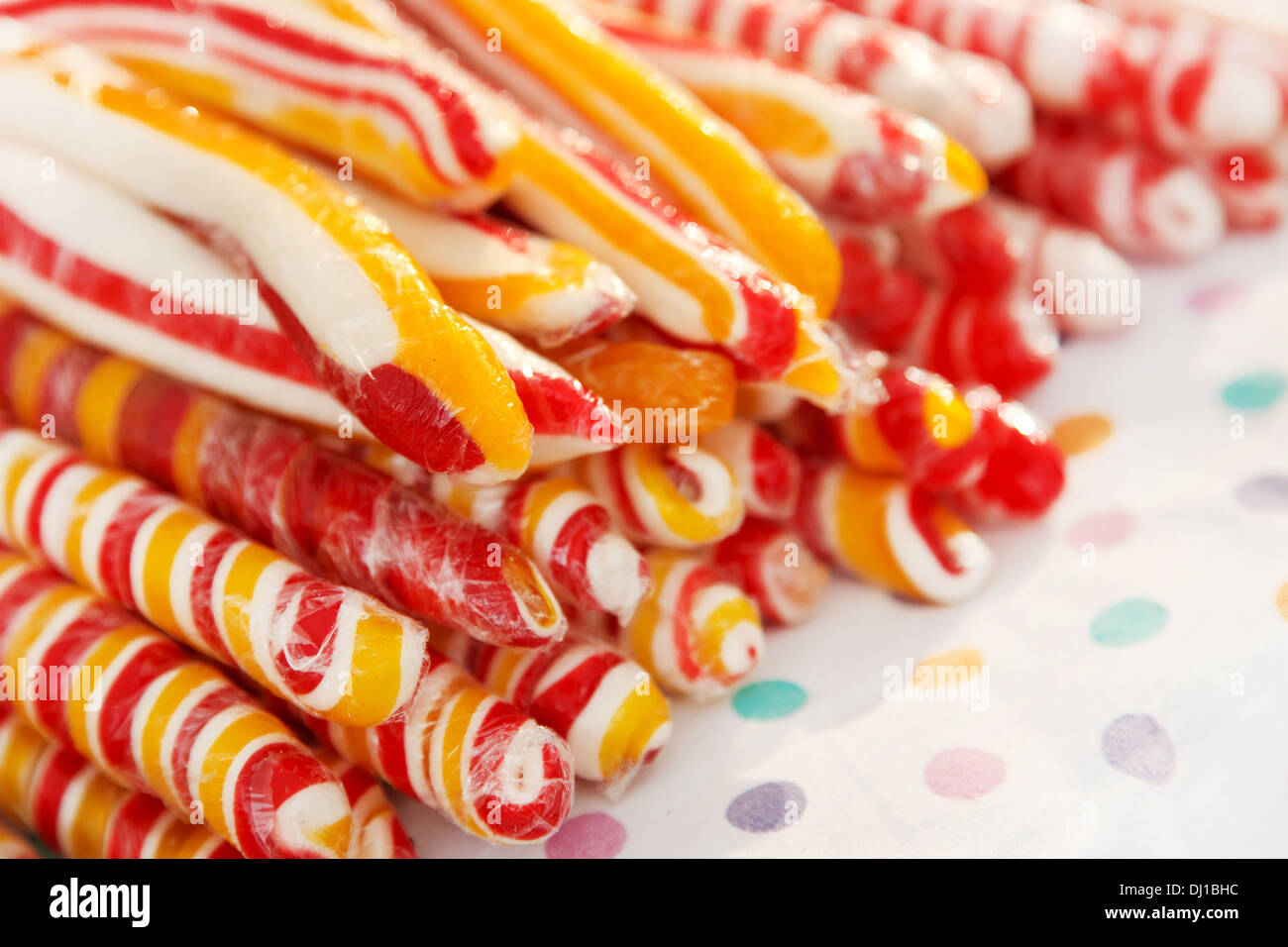 Stack of colorful, twisted sugar bars Stock Photo - Alamy