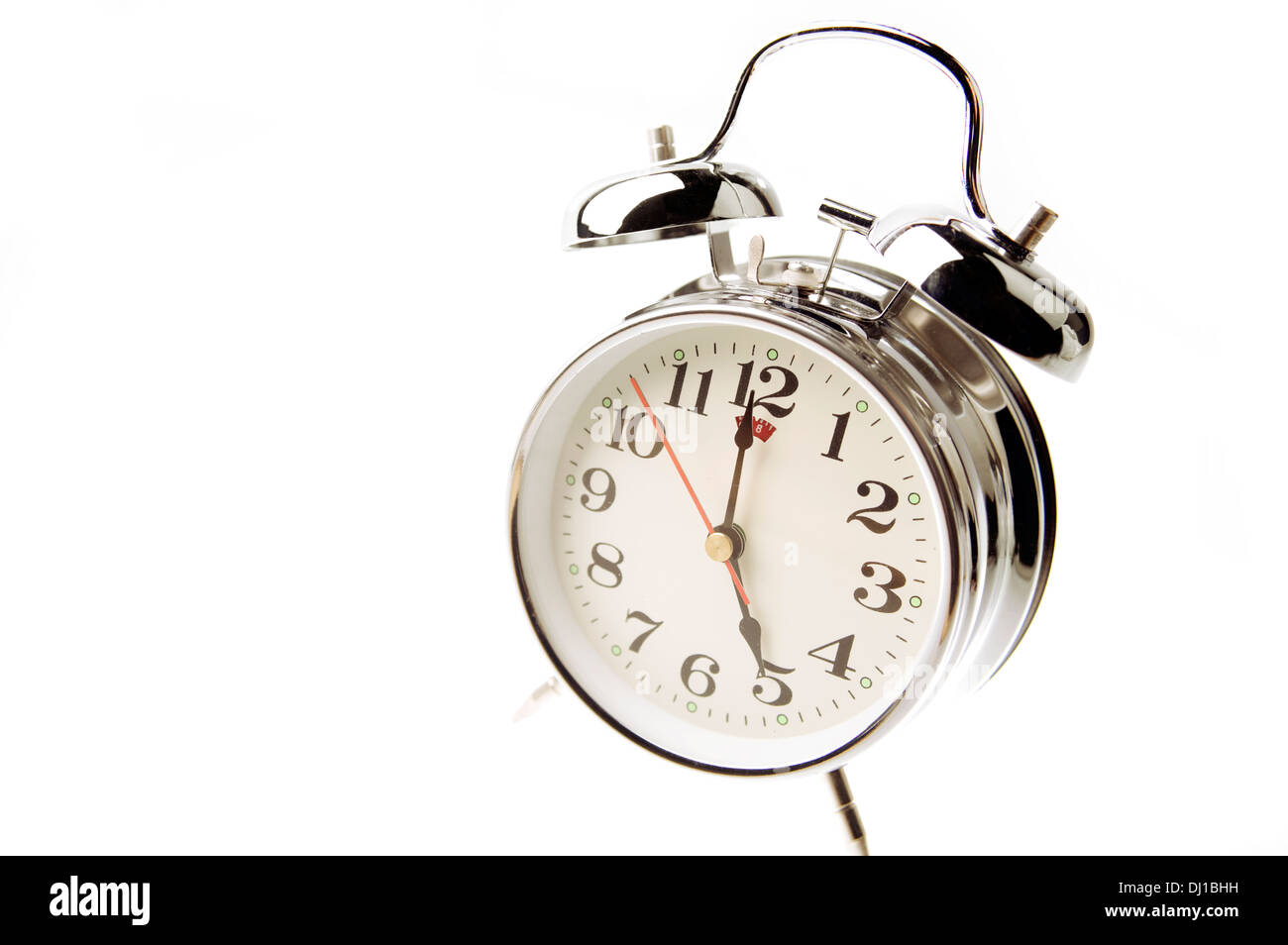 Alarm clock on plain background Stock Photo - Alamy