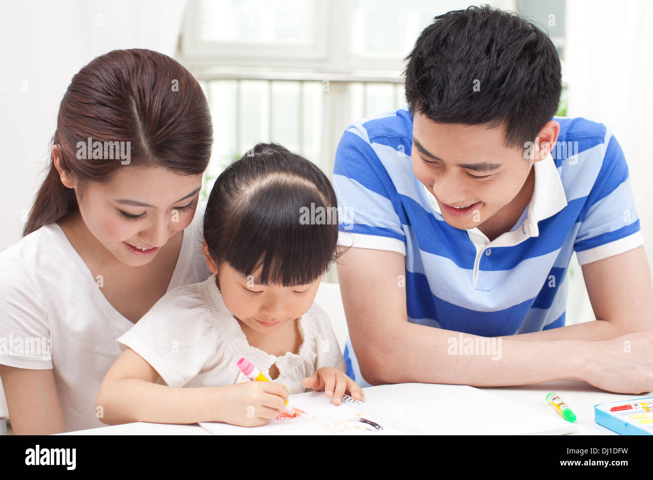 Family writing graffiti Stock Photo - Alamy