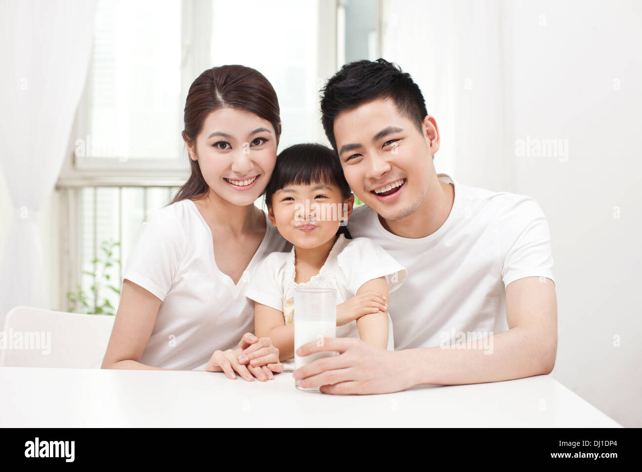 Healthy family and milk Stock Photo - Alamy