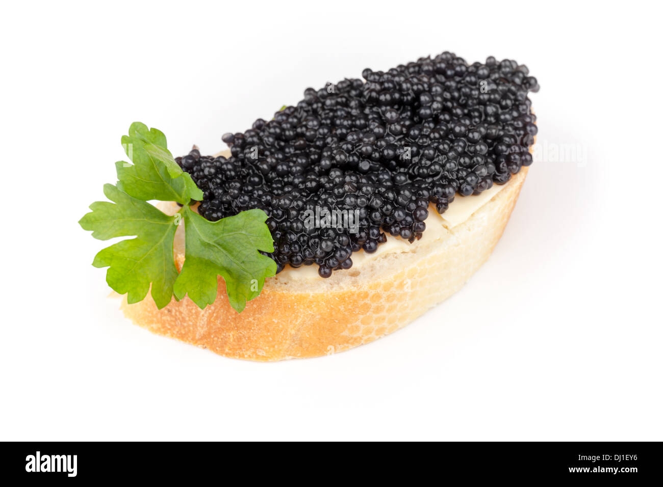 Small sandwich with black caviar isolated on white background Stock ...