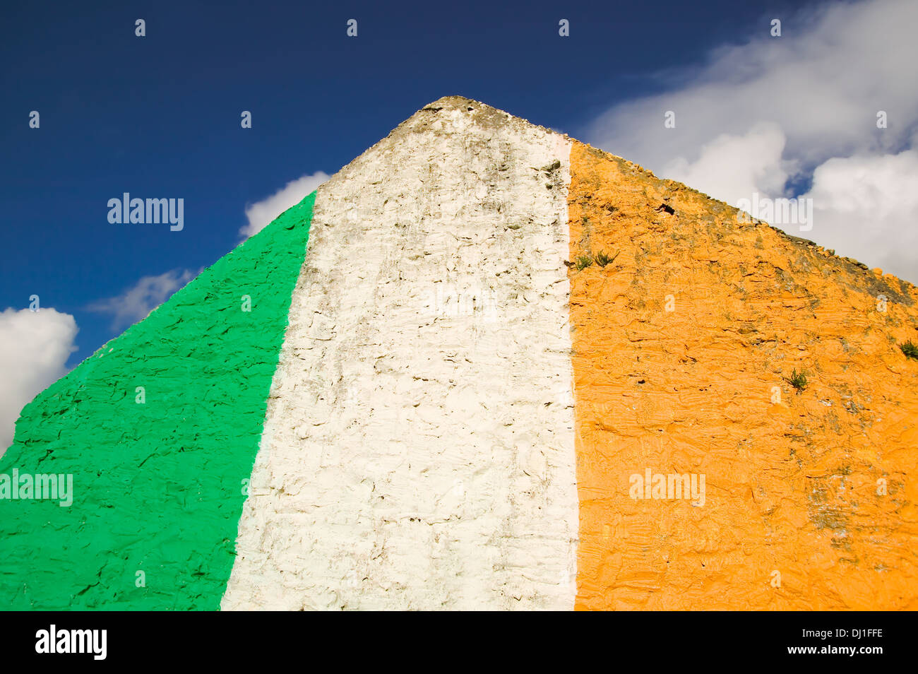 Irish flag, painted on wall of village house Stock Photo - Alamy