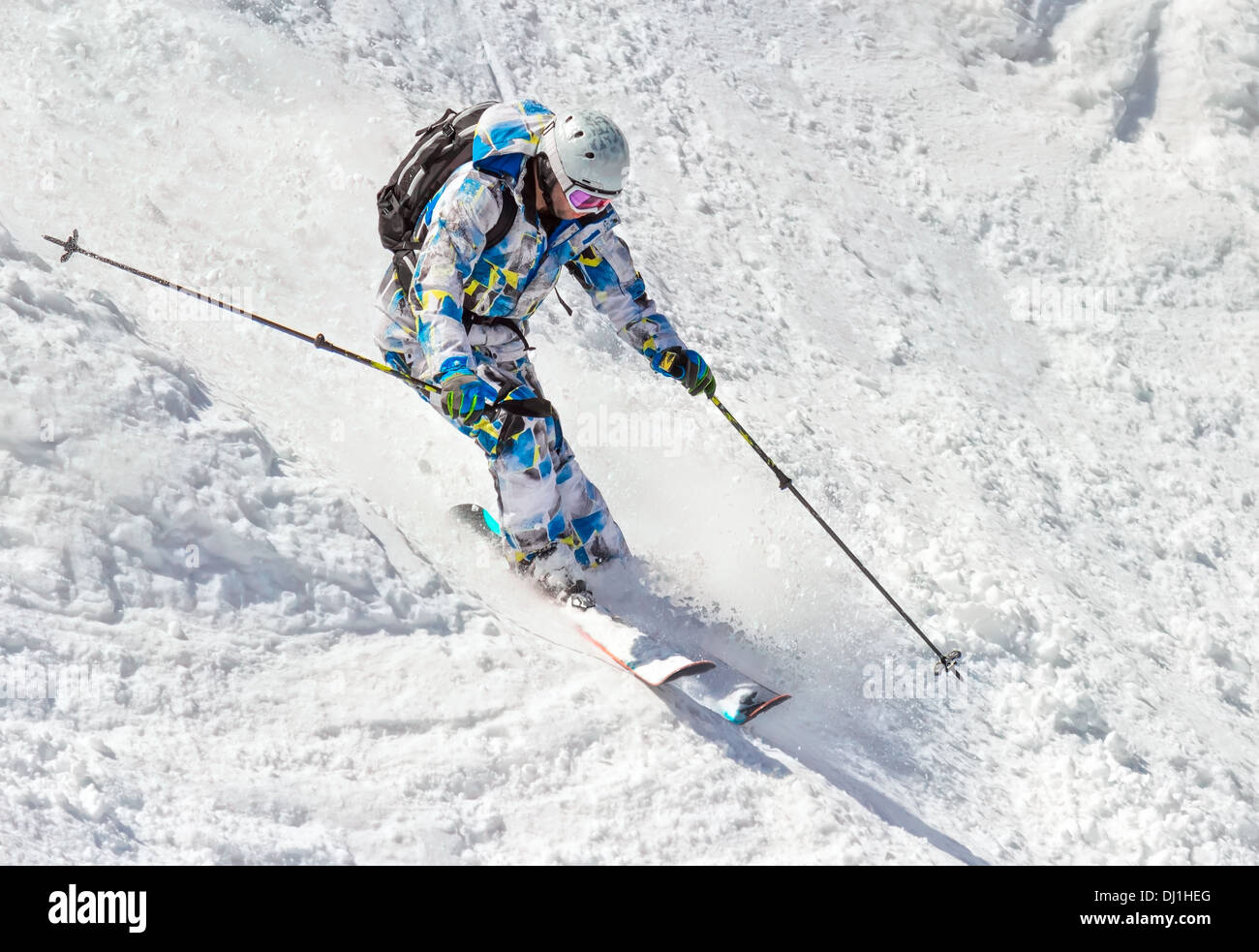 Skier on steep slope hi-res stock photography and images - Alamy